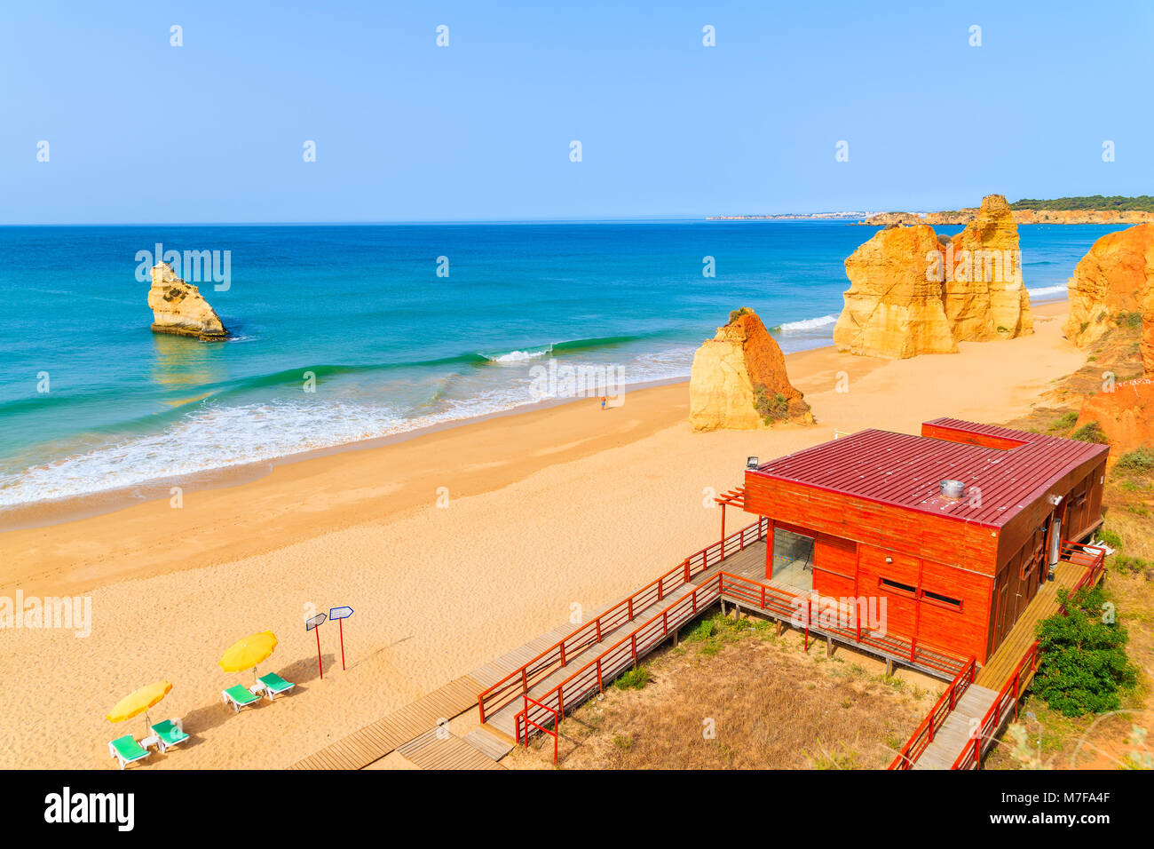 View of beautiful sandy Praia da Rocha beach in Portimao town, Algarve ...