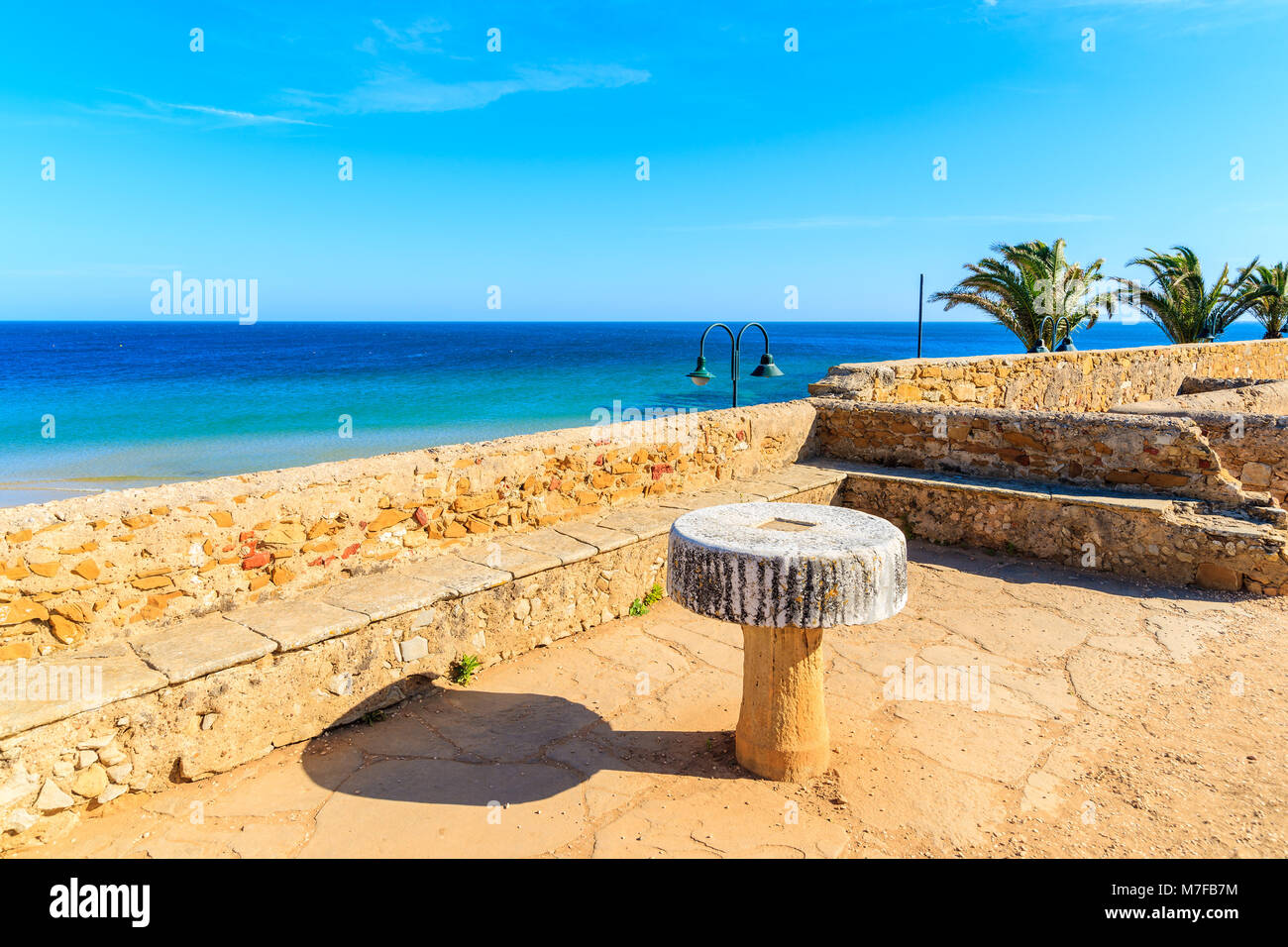 Coastal promenade along sea in Luz town, Algarve region, Portugal Stock ...