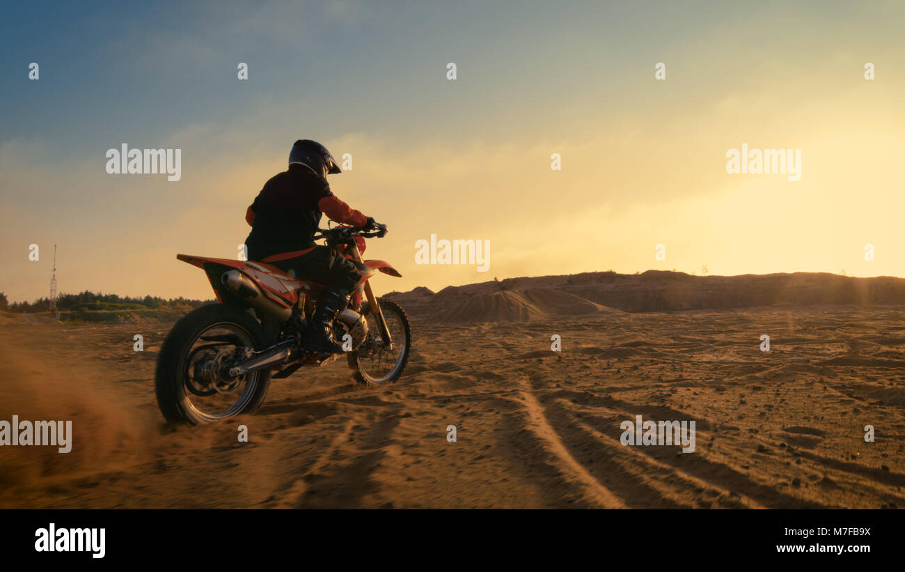 Shot of the Professional Motocross Driver Riding on His FMX Motorcycle ...