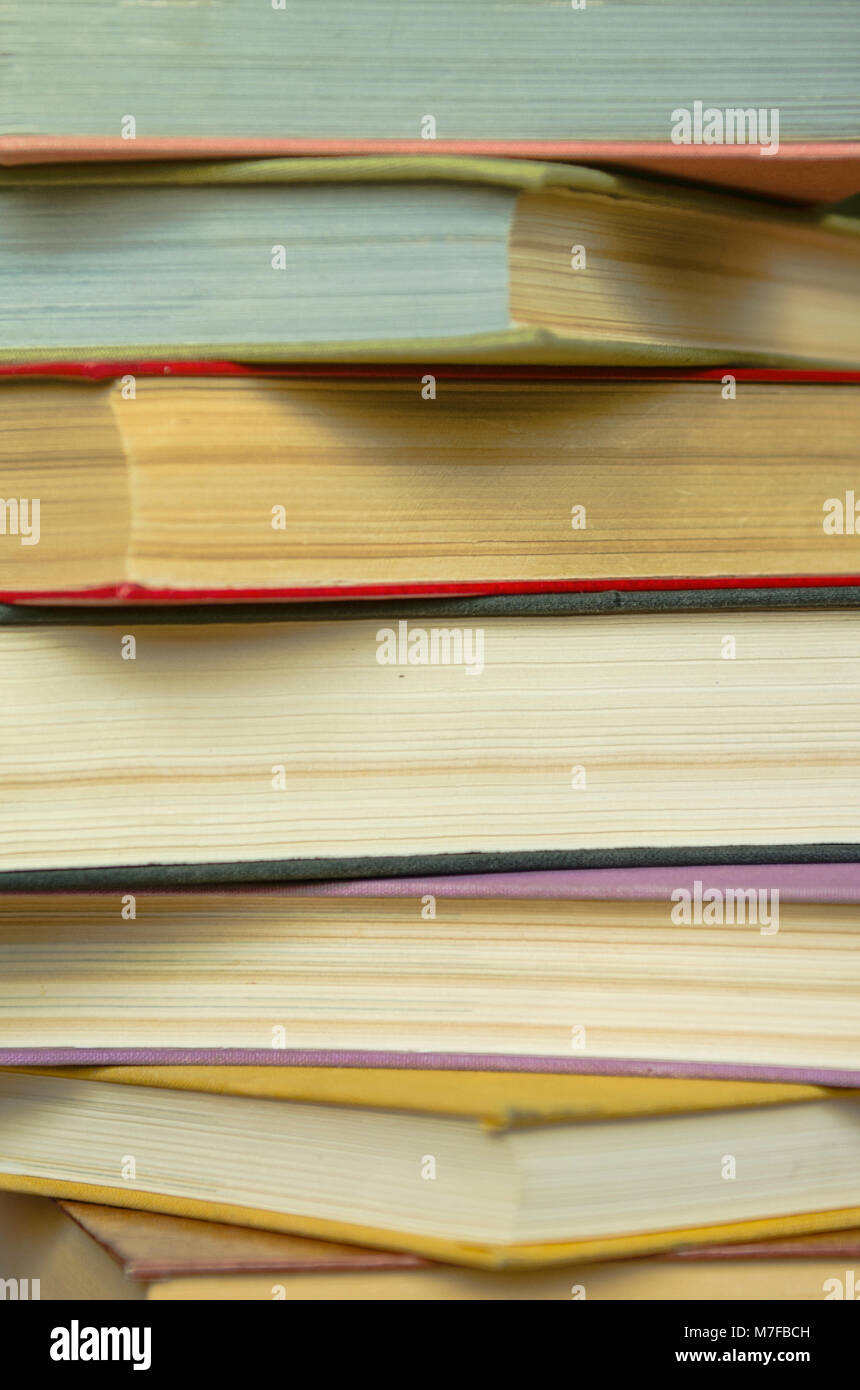 Stack of books background. many books piles Stock Photo - Alamy