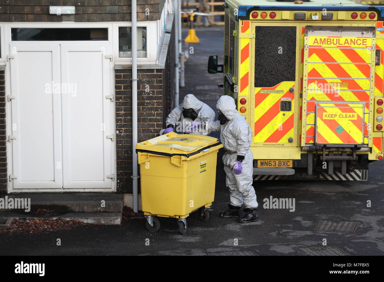 Investigators in gas masks at the South Western Ambulance Service ...