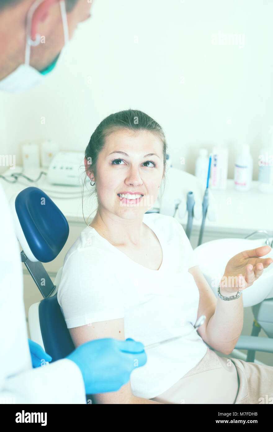 Female is consulting with dentist in the clinic Stock Photo - Alamy