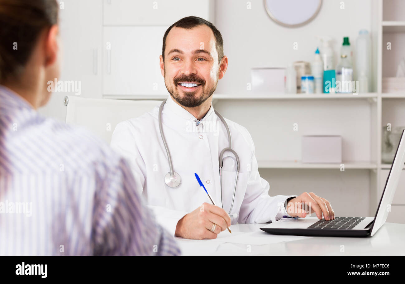 Man doctor consultation client in hospital Stock Photo - Alamy