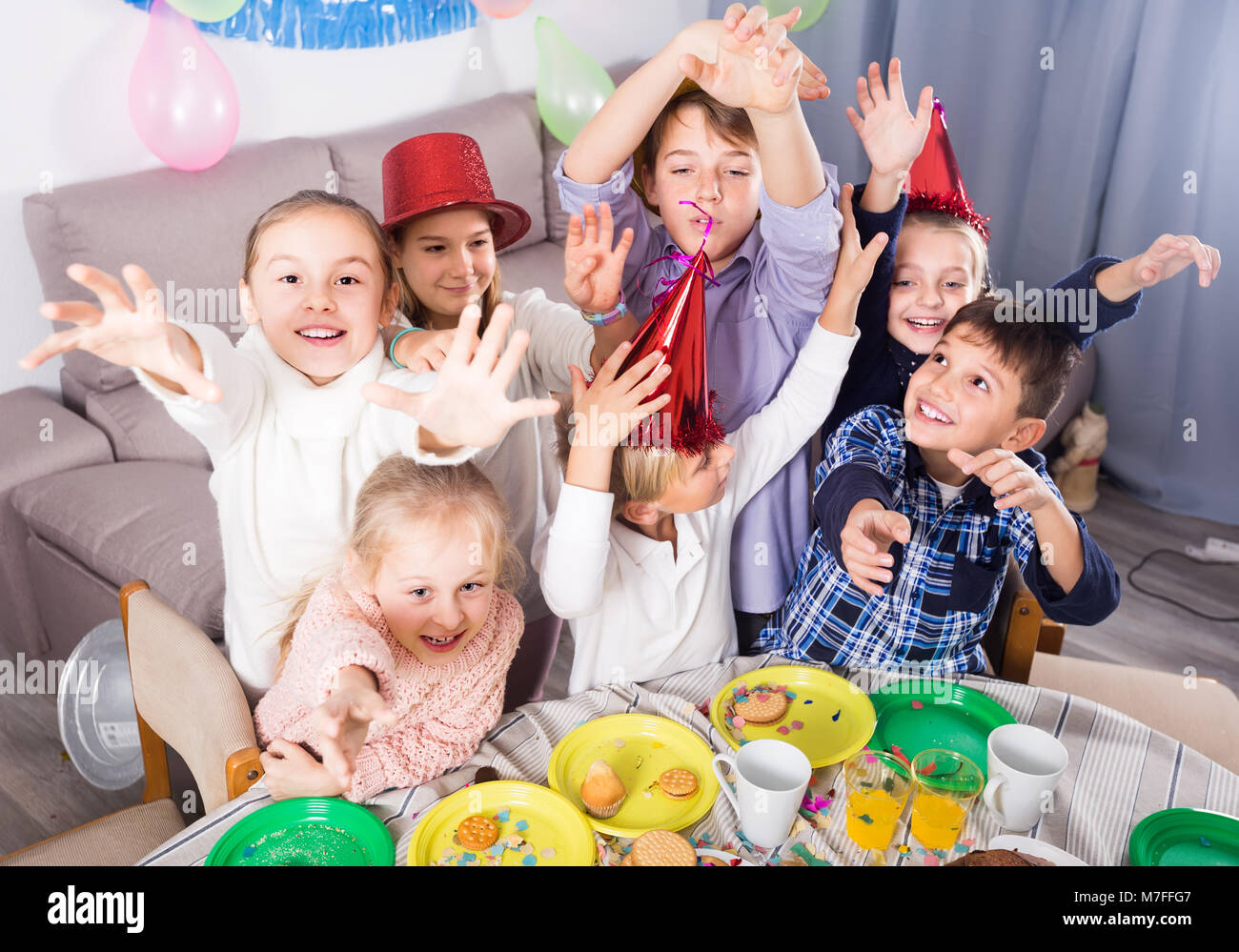 celebrating kids having good time during friend’s birthday party Stock ...