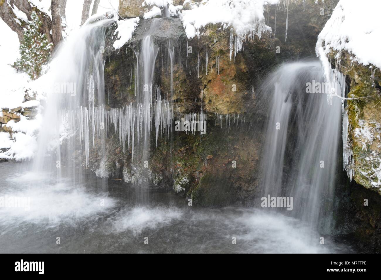 winter landscape of waterfall on the river Stock Photo - Alamy