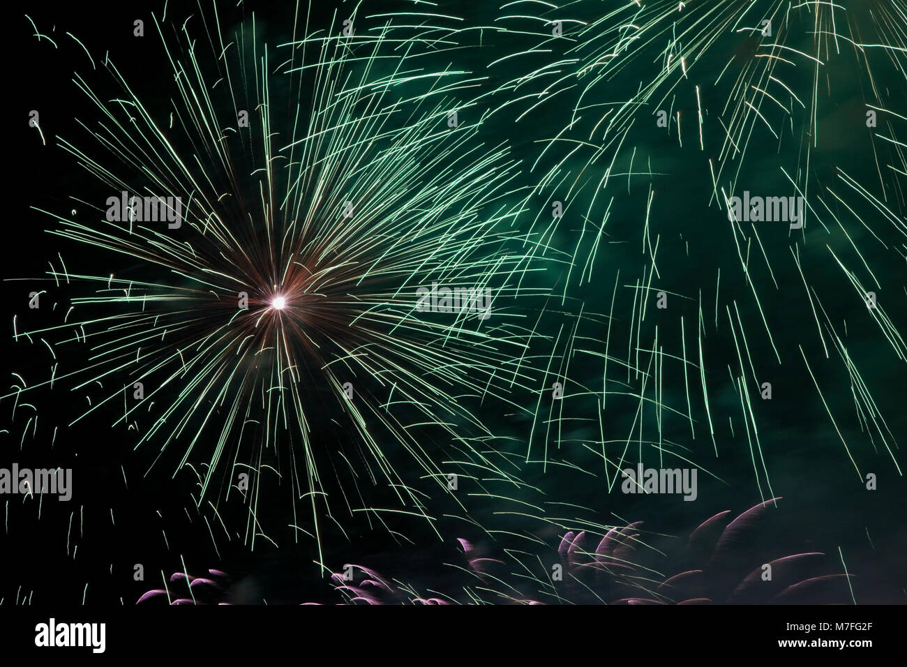Green fireworks in night sky, La Ronde, Montreal, Quebec, Canada Stock ...