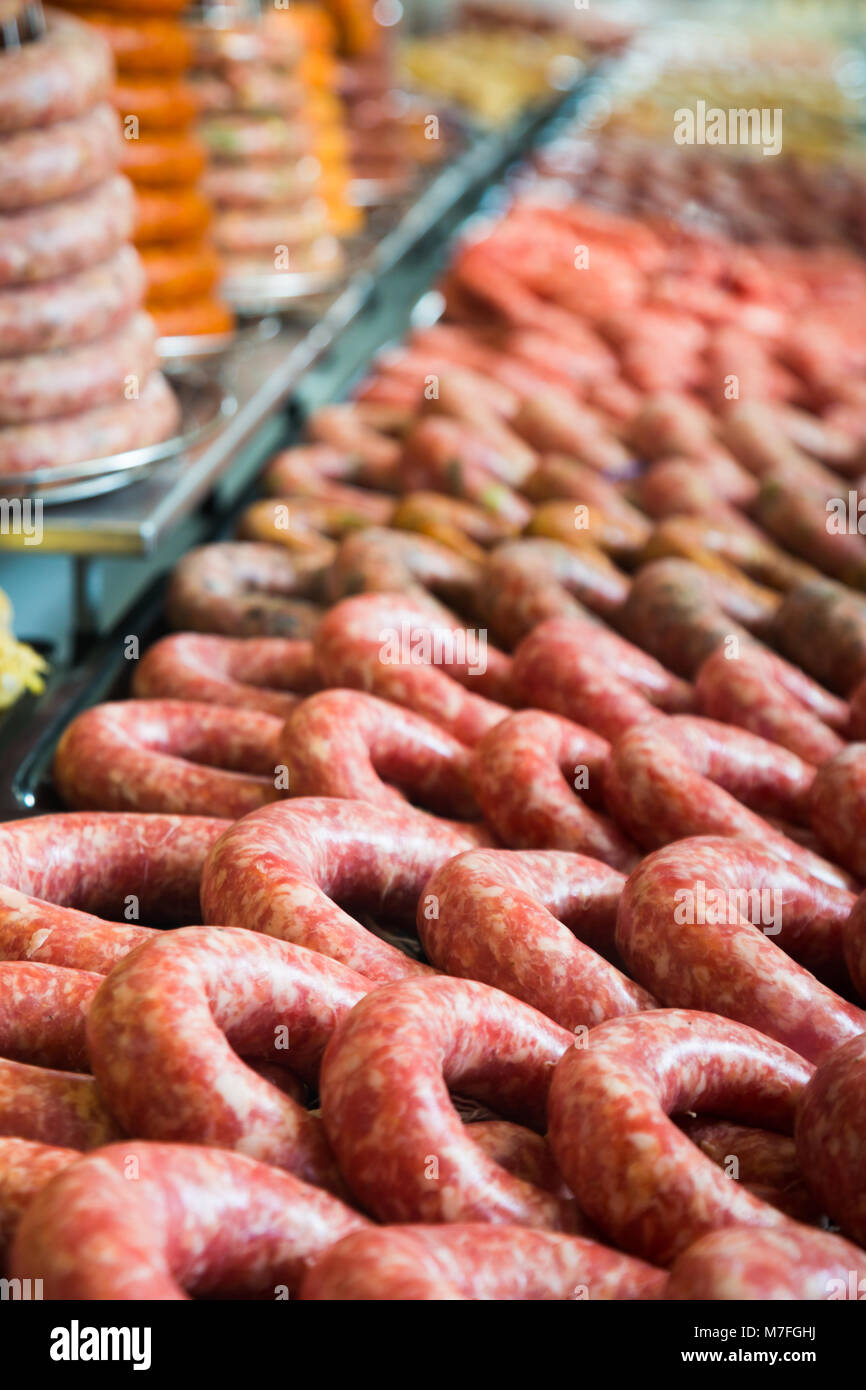 Raw sausage on counter in supermarket, close up Stock Photo - Alamy