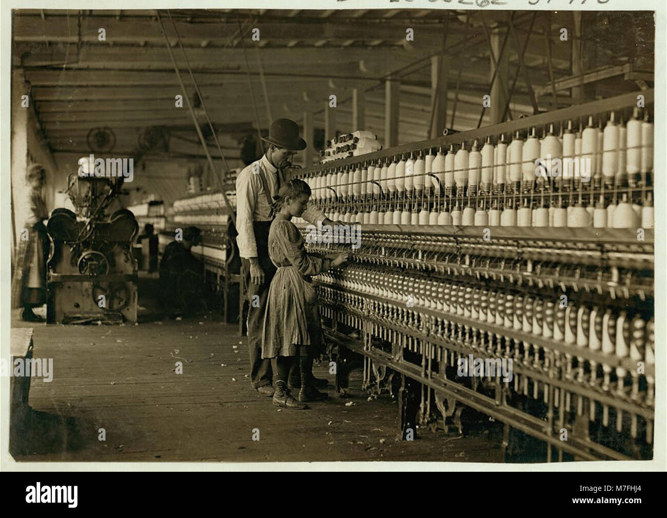 Vintage photo cotton spinners hi-res stock photography and images - Alamy