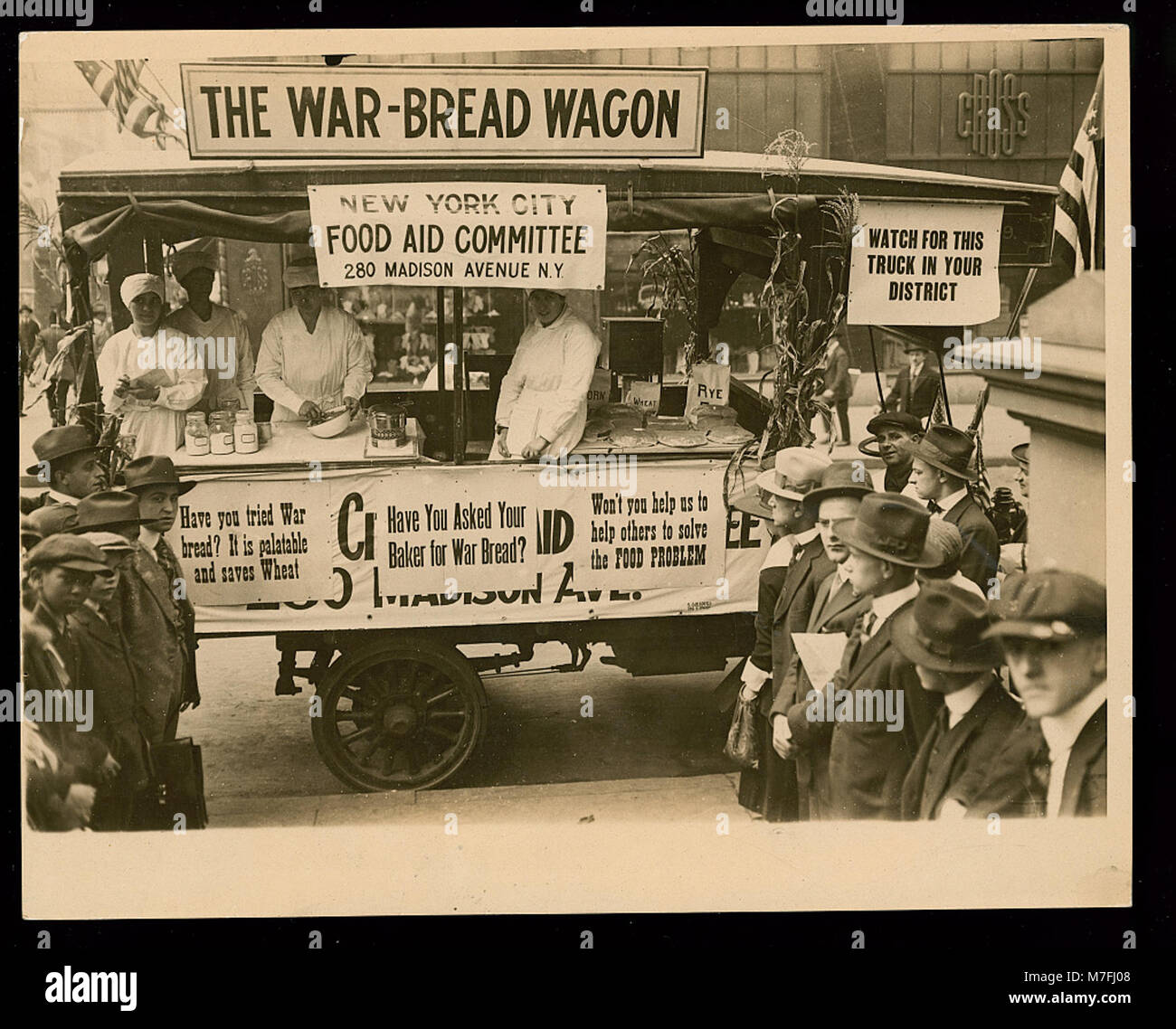 A wartime photograph showing a 'war-bread wagon,' which was used to ...