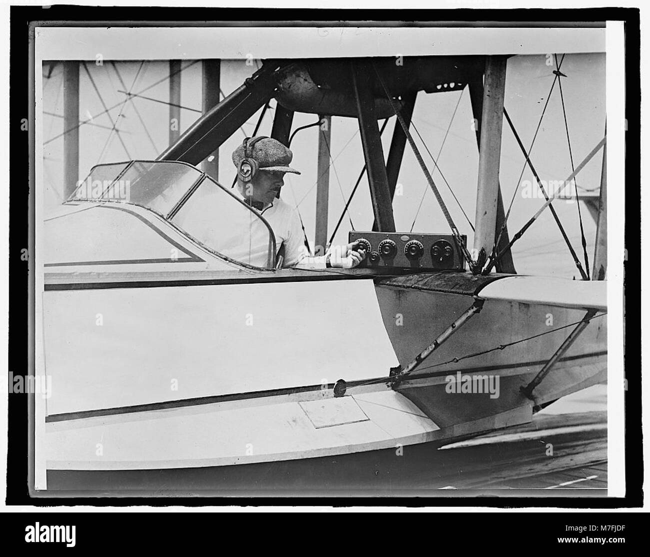 A historic image of radio equipment installed in an airplane ...