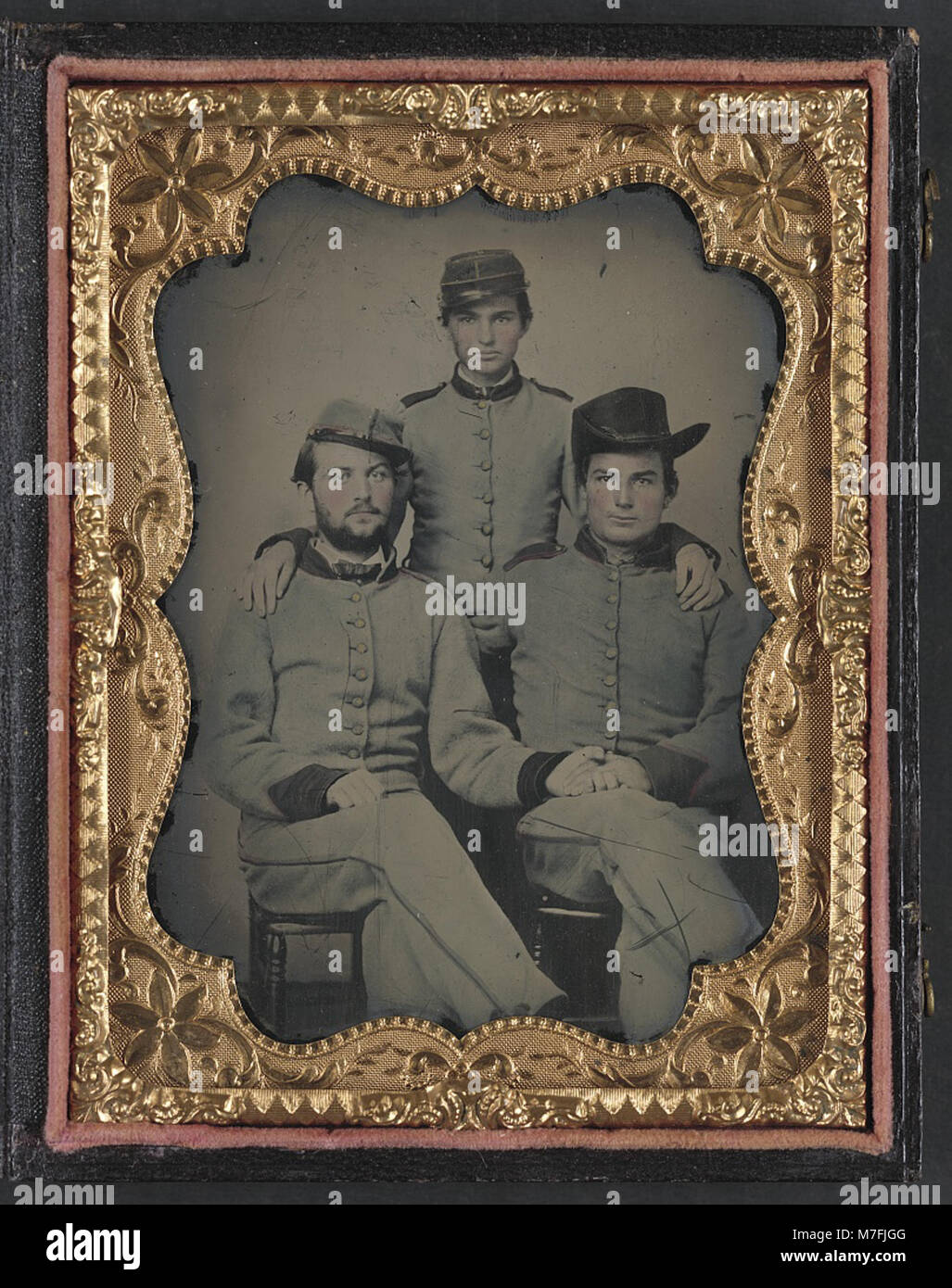 Three soldiers in Confederate artillerymen uniforms, posing for a ...