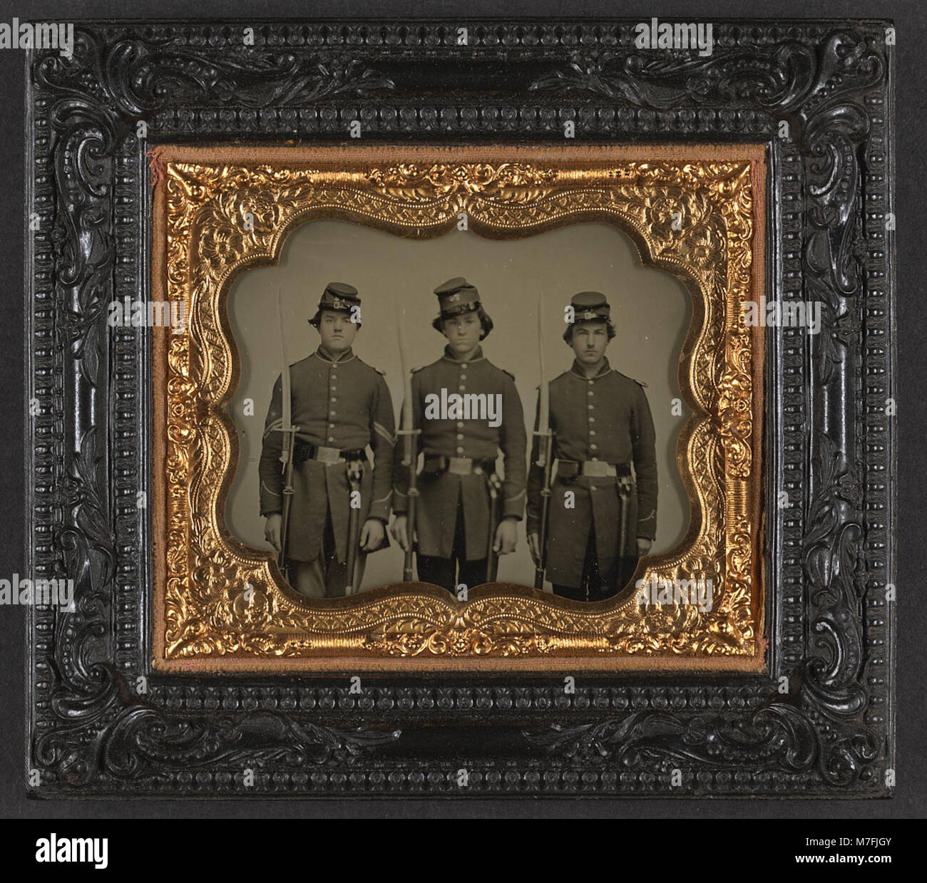 A photograph of three Union soldiers from the American Civil War ...