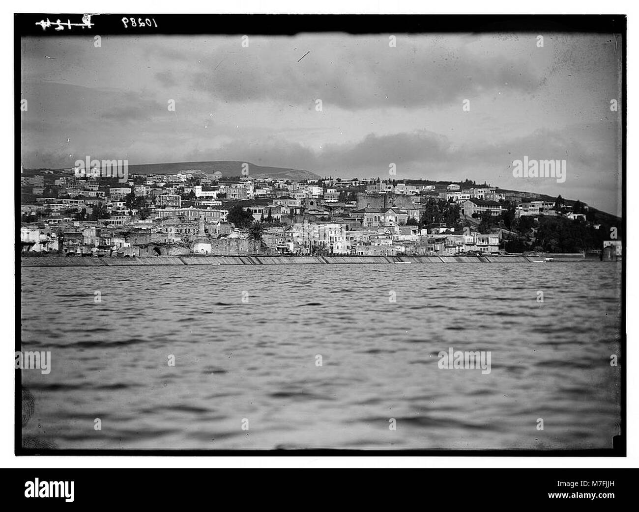 A photograph showing the view of Tiberias from the lake, capturing the ...