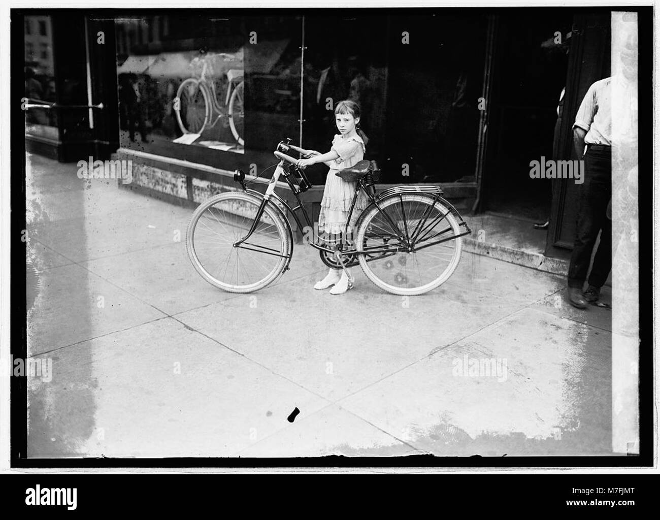 Girl on bicycle photo Black and White Stock Photos & Images - Alamy