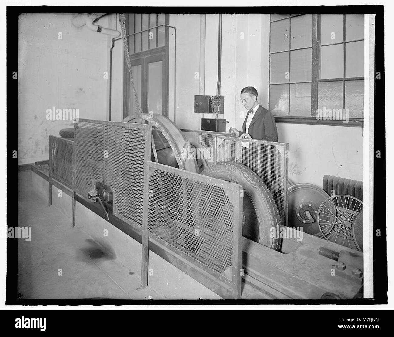 This photograph shows tire testing conducted by the Bureau of Standards ...