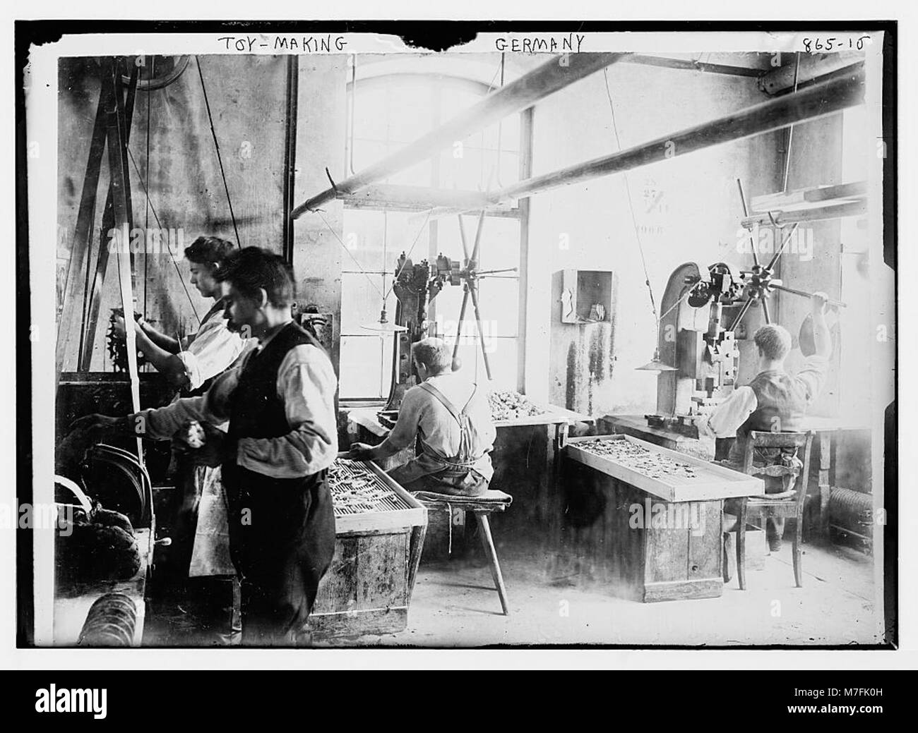 A photograph showing German toy-makers at work, reflecting the country ...