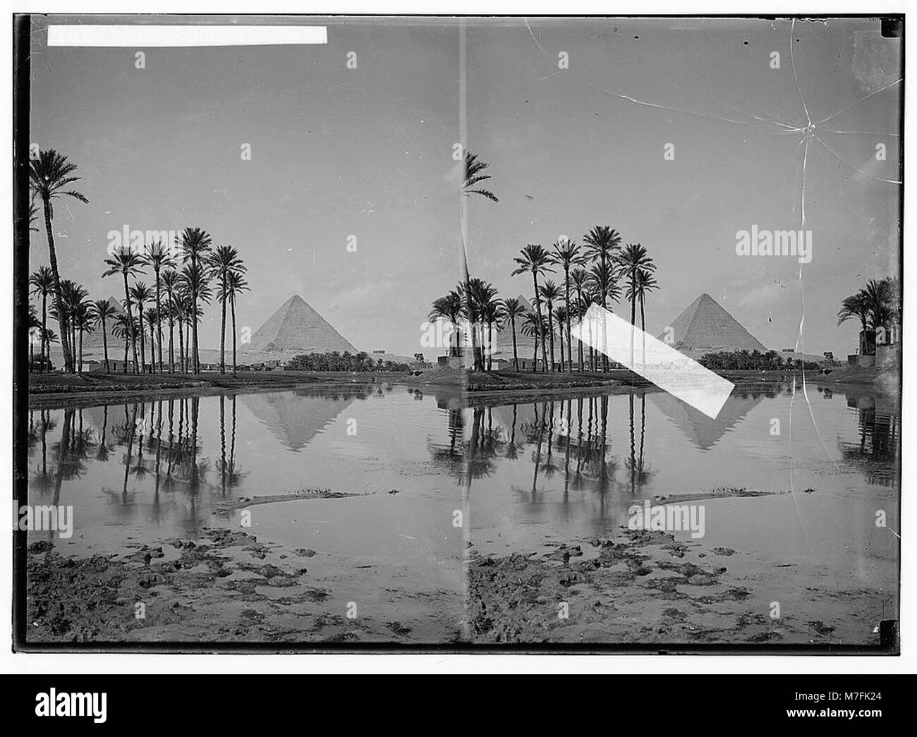 A scenic photograph capturing a view of the pyramids in Egypt, with a ...