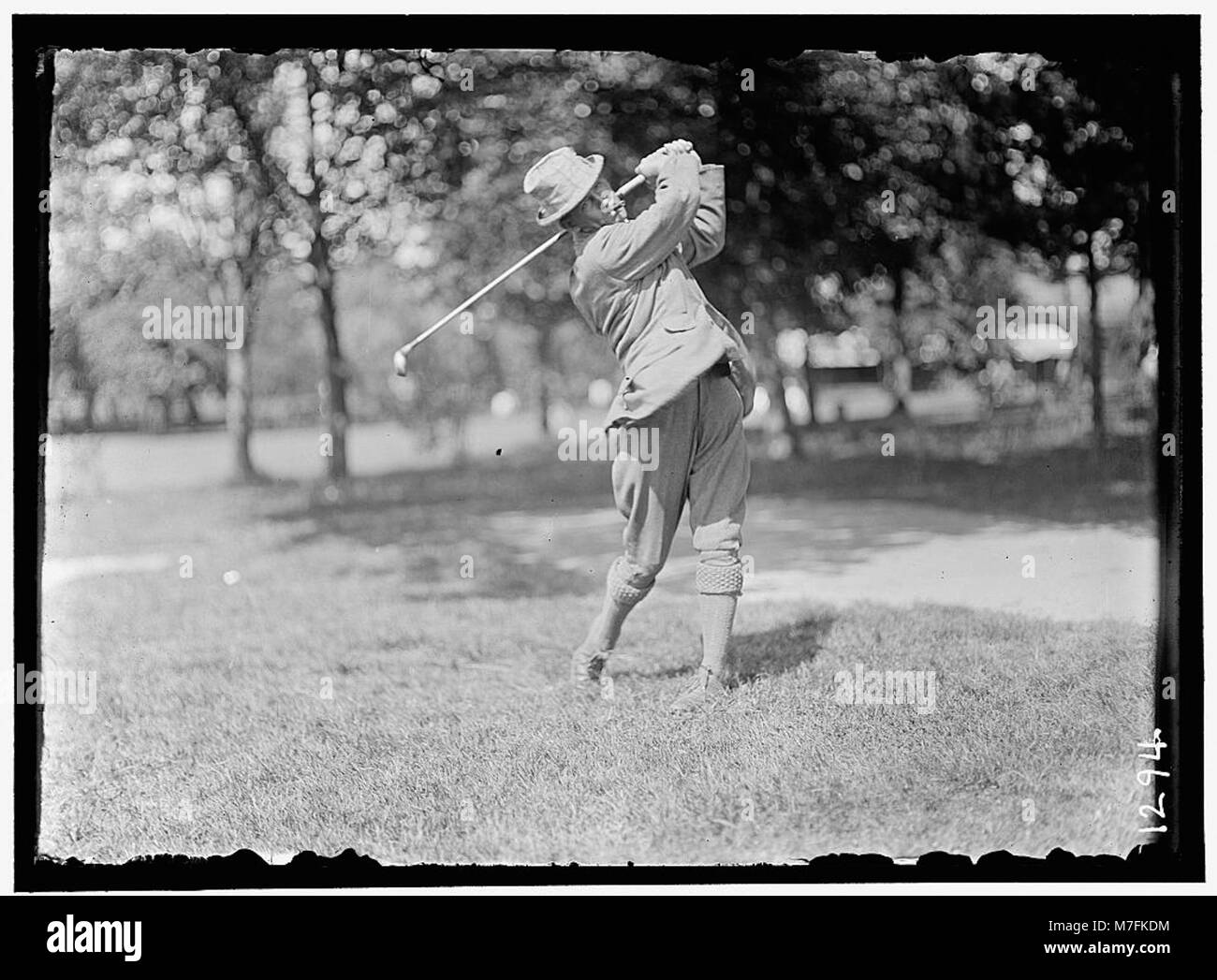 TRAVIS, WALTER. PLAYING GOLF LOC hec.01063 Stock Photo - Alamy
