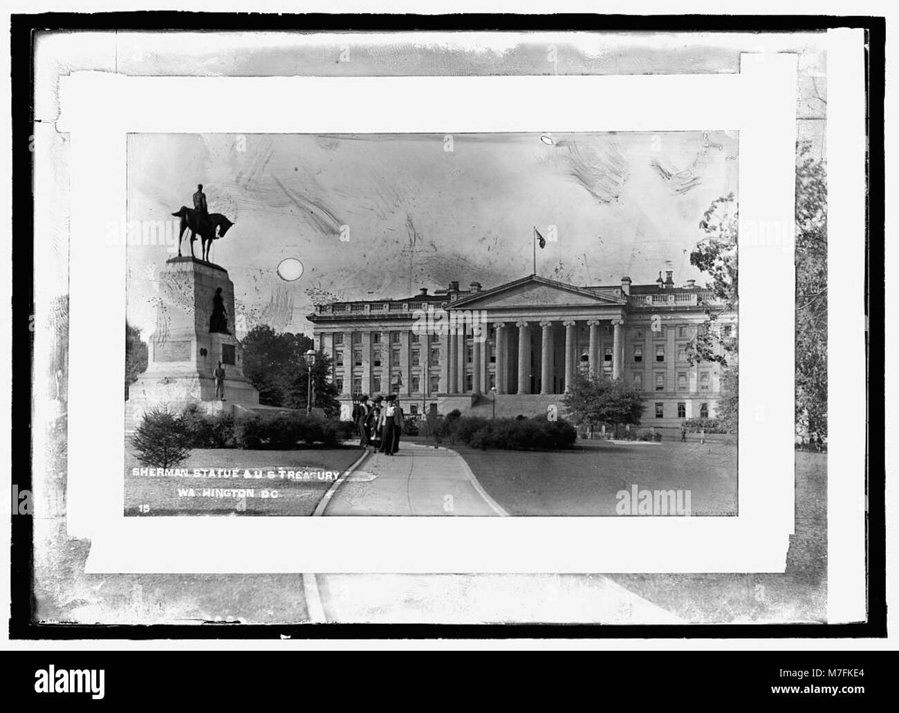 A photo of the Treasury building with the Sherman statue in Washington ...