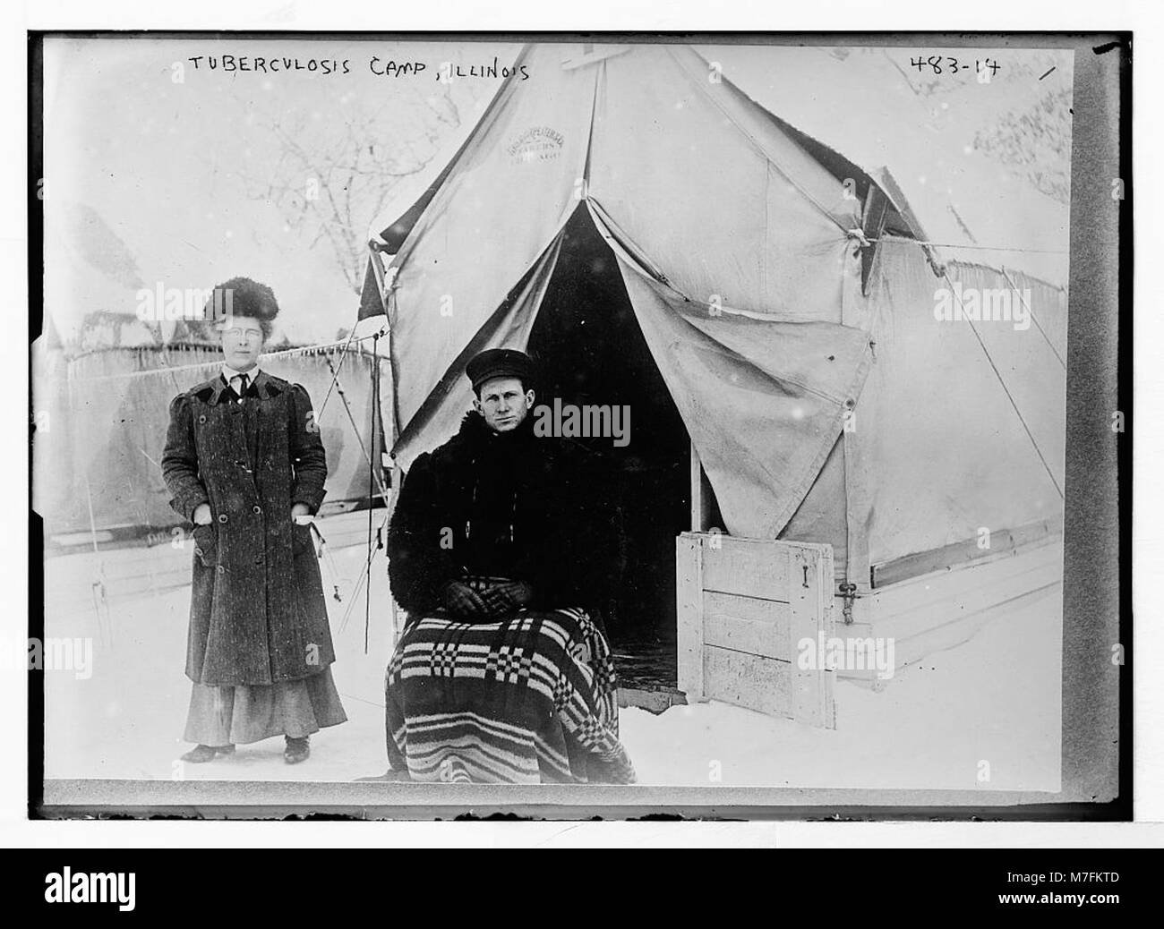 This historical photograph depicts a tuberculosis camp in Illinois ...