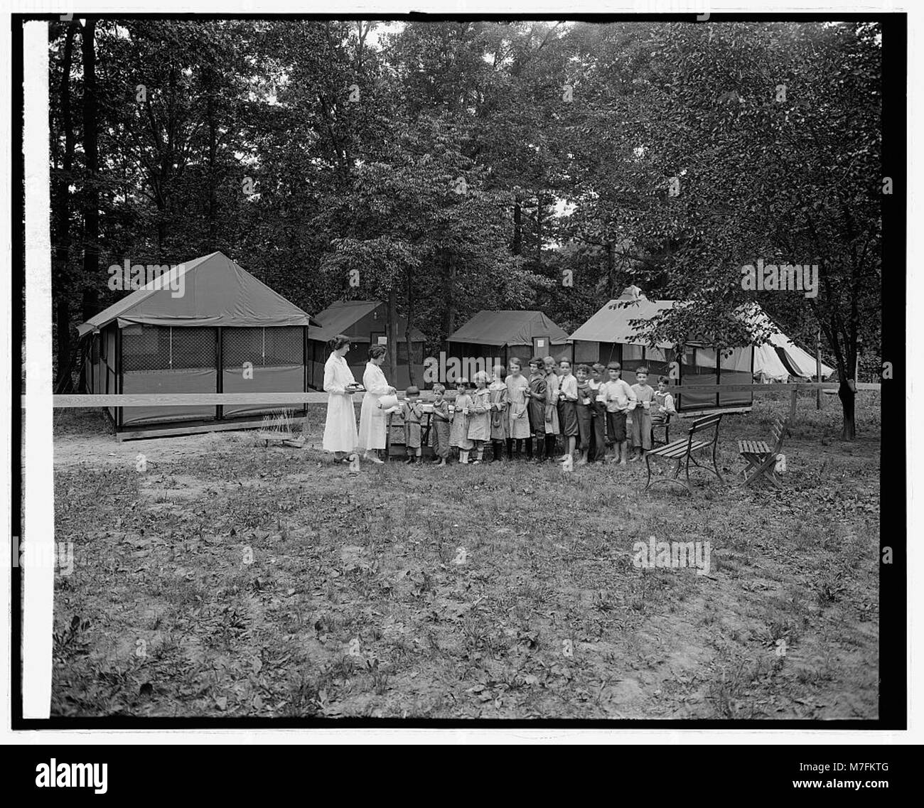 A photograph depicting a tuberculosis camp, where patients are treated ...