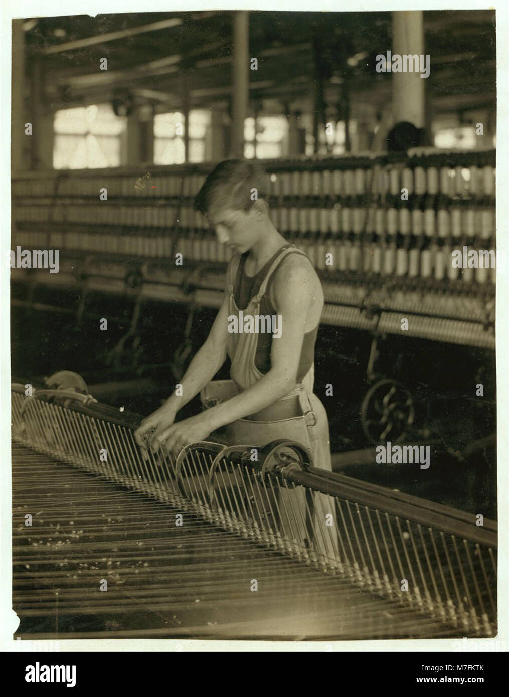 Photograph of a 16-year-old boy working in the mule room of Berkshire ...