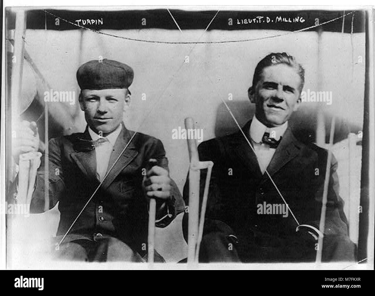 This photograph features Turpin and Lt. T.D. Milling in an aircraft ...