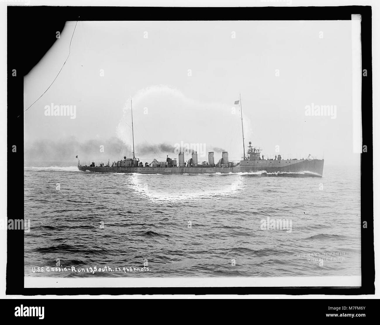 A photograph of the U.S.S. Cassin, a U.S. Navy ship known for its ...