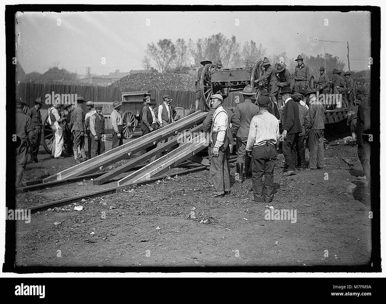 Photograph showing the U.S. Army transporting military equipment and ...