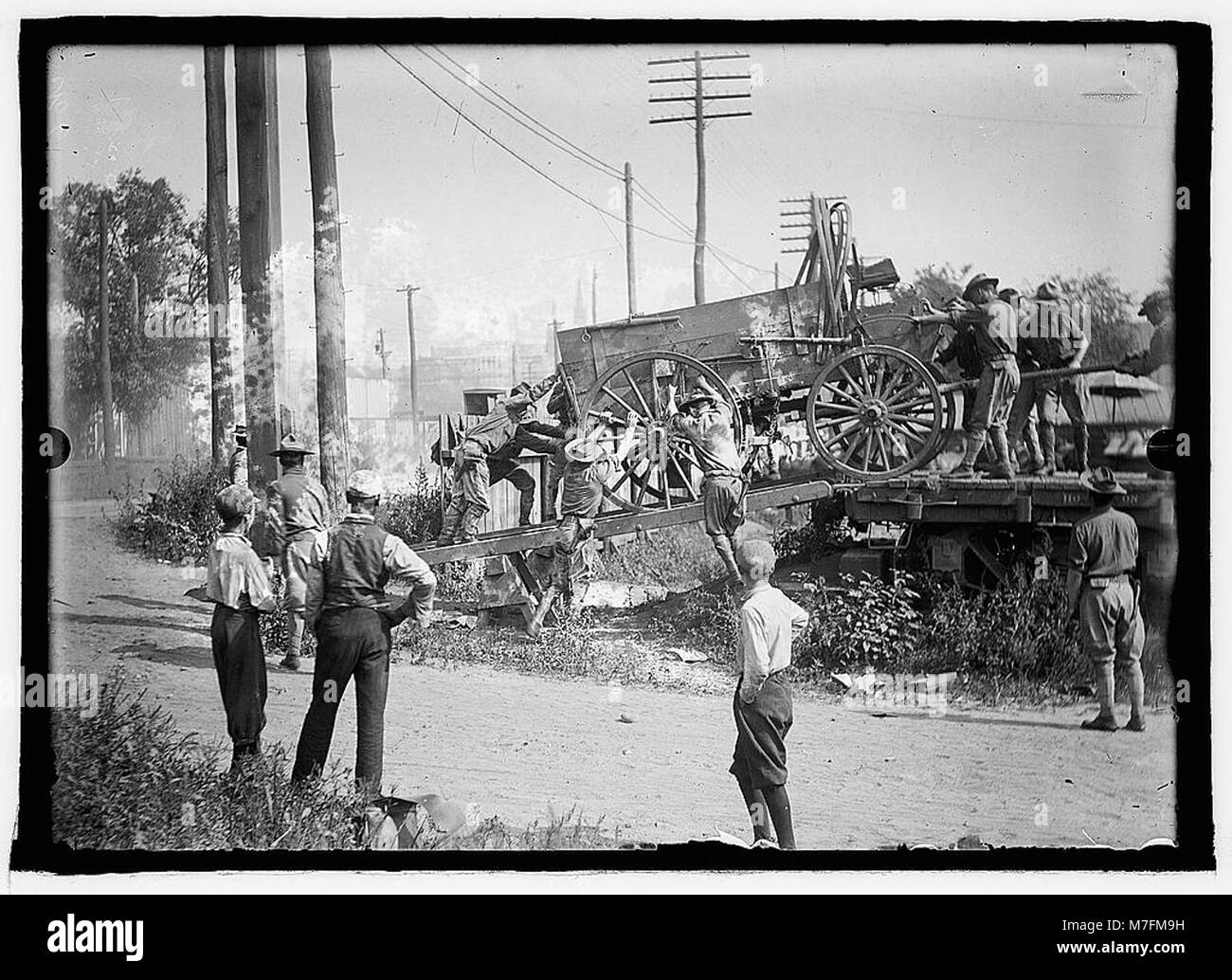 The U.S. Army is shown transporting military equipment and troops ...