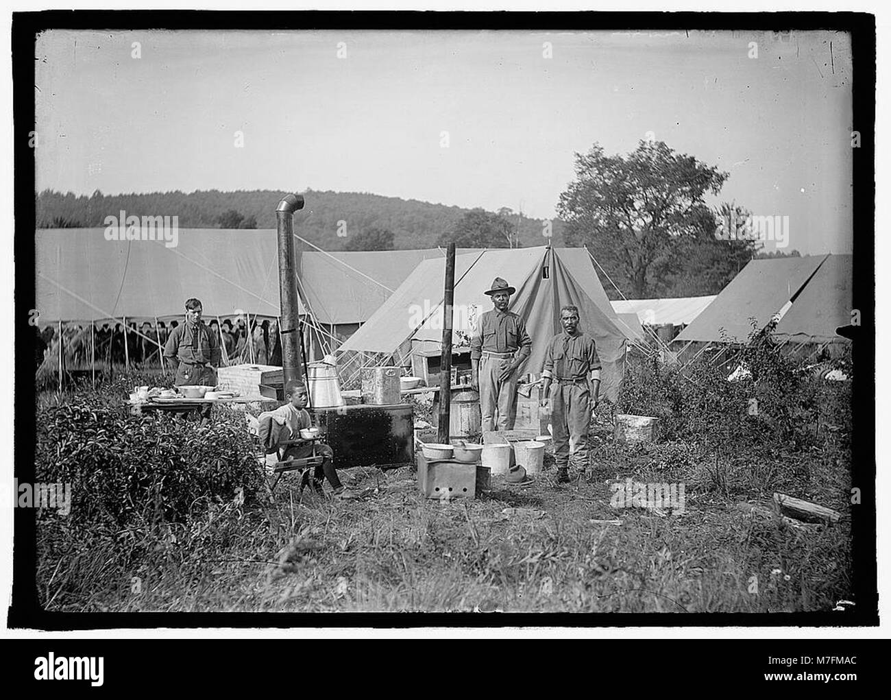 A photograph of a U.S. Army camp kitchen, depicting the setup and ...