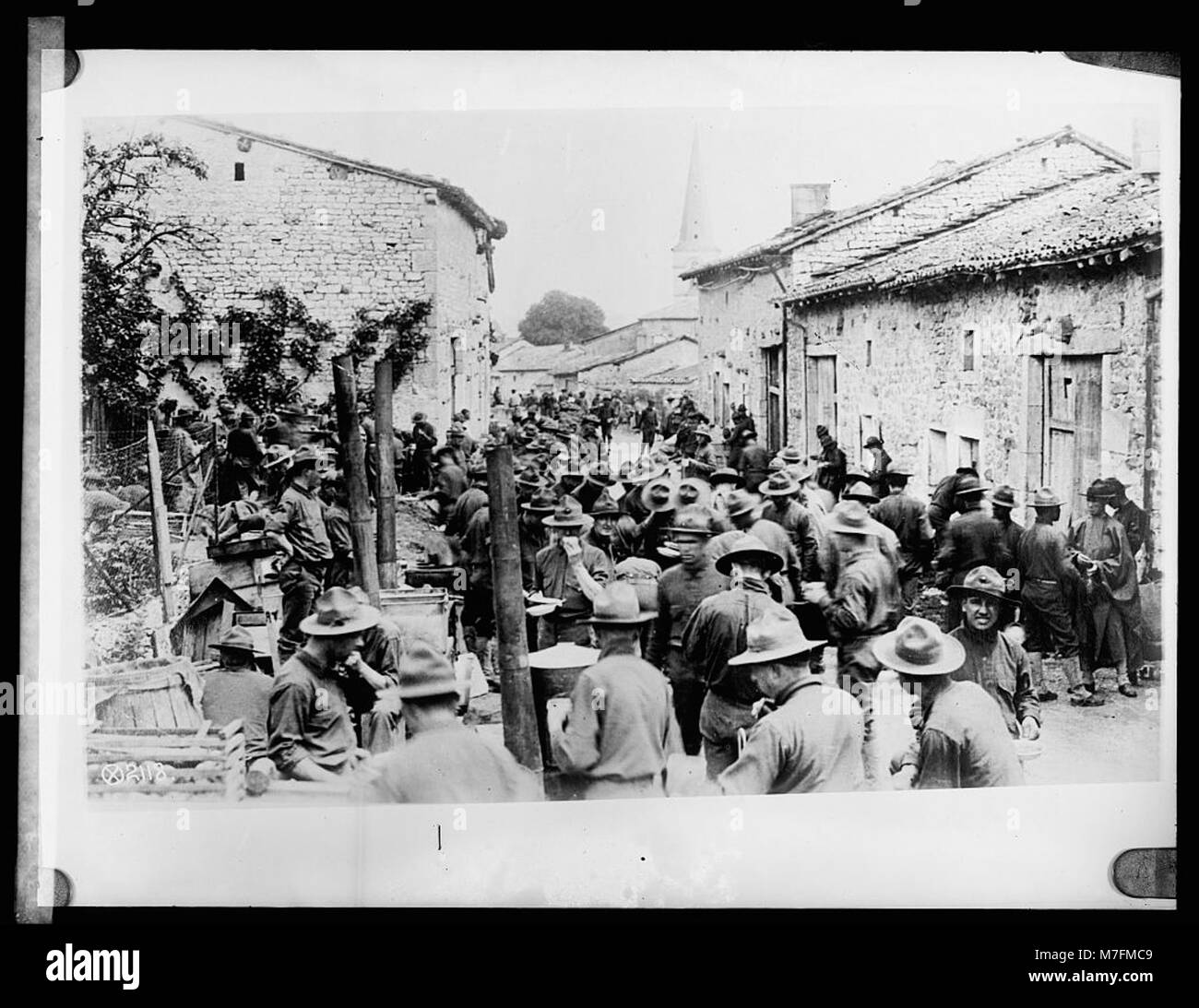 A photograph of U.S. Army troops abroad, likely during a wartime ...