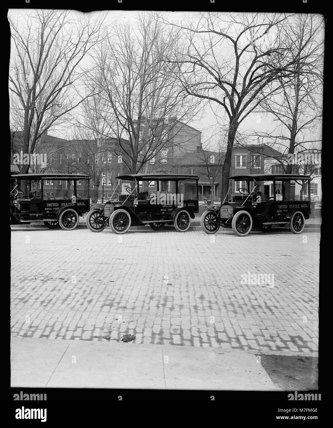 Early 20th-century photograph of U.S. Mail trucks used for postal ...