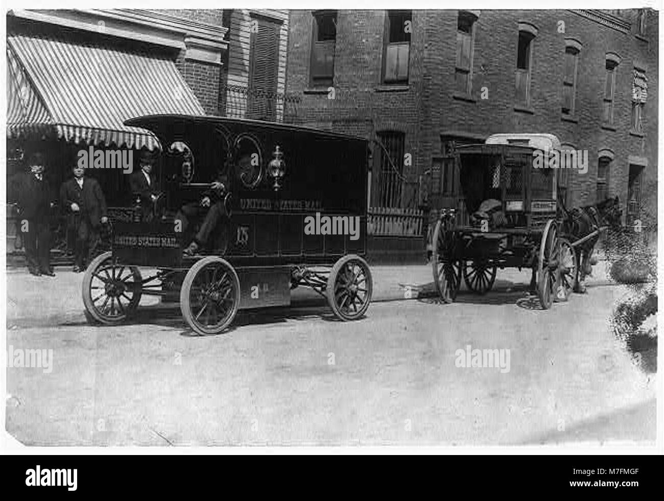 A historical image of a U.S. mail truck, used for the transportation of ...