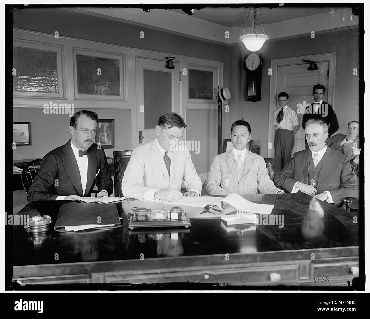 The U.S. Shipping Board is seen signing a contract with China, marking ...