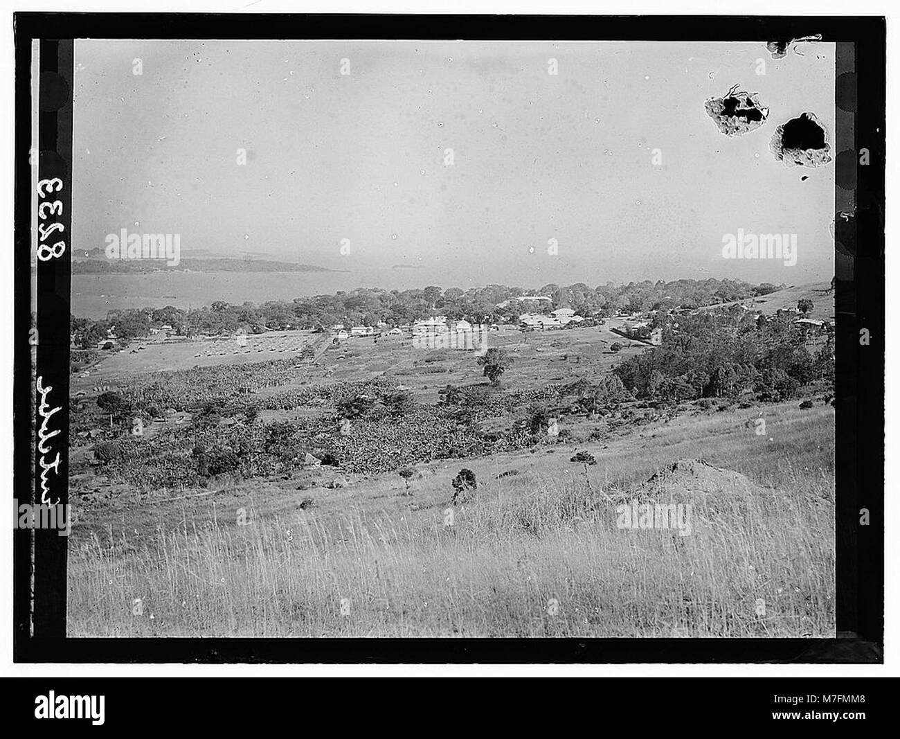 This photograph shows a view of Entebbe, Uganda, from a hill to the ...