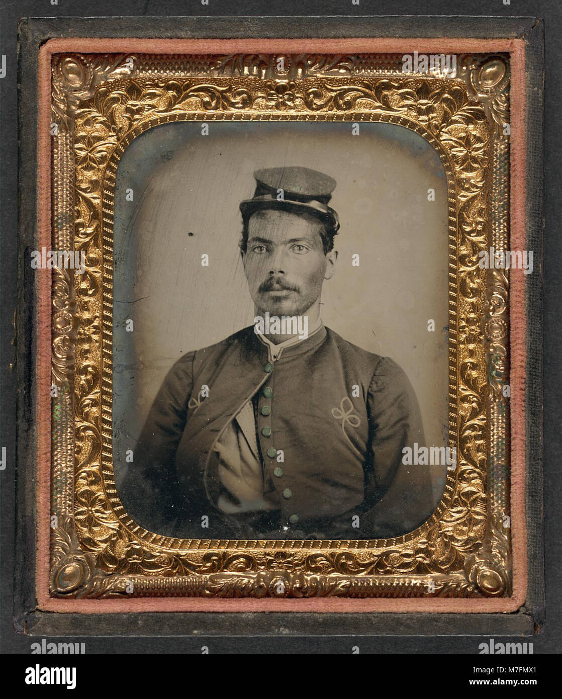 An African American soldier dressed in a Union Zouave uniform, likely ...
