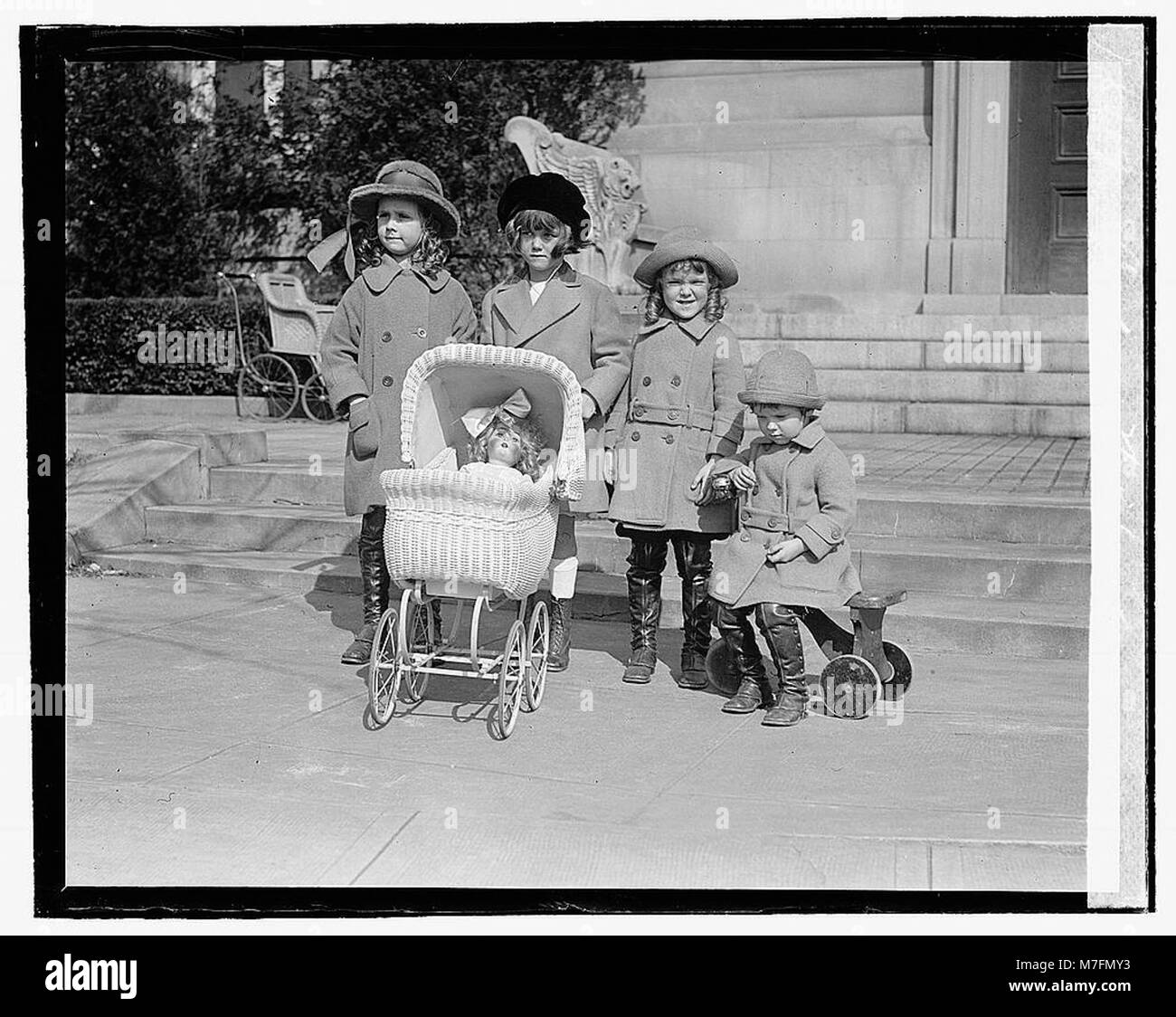 A black-and-white photograph showing a group of unidentified children ...