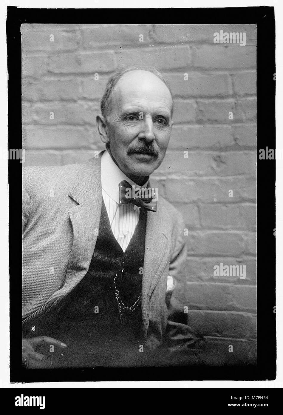 This image features an unidentified man, captured in a photograph. The ...