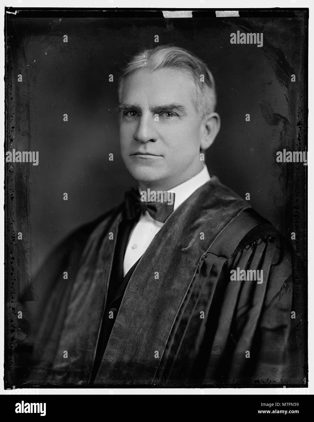 A portrait of an unidentified man, captured in a historical photograph ...
