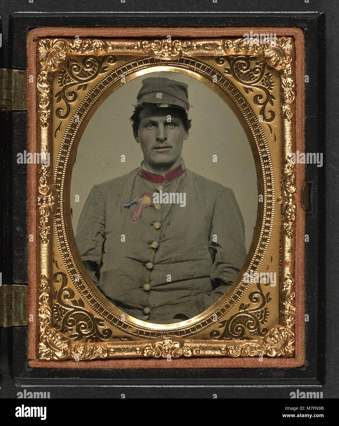 A portrait of an unidentified Confederate soldier wearing an artillery ...
