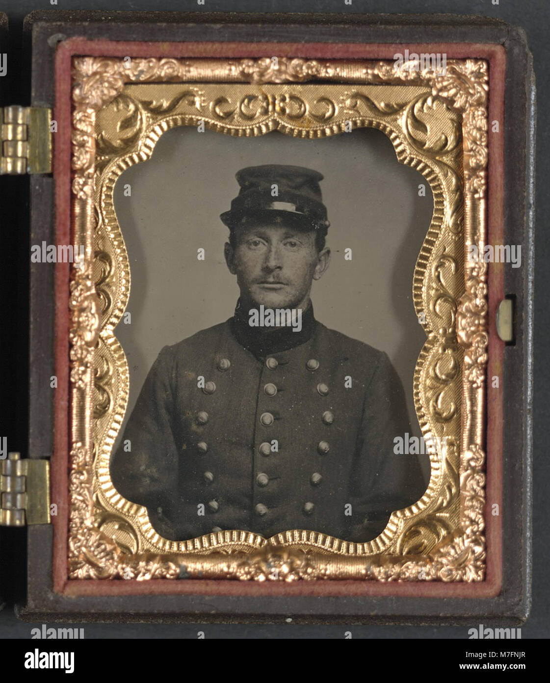 A photograph of an unidentified Union soldier, wearing a jacket with ...