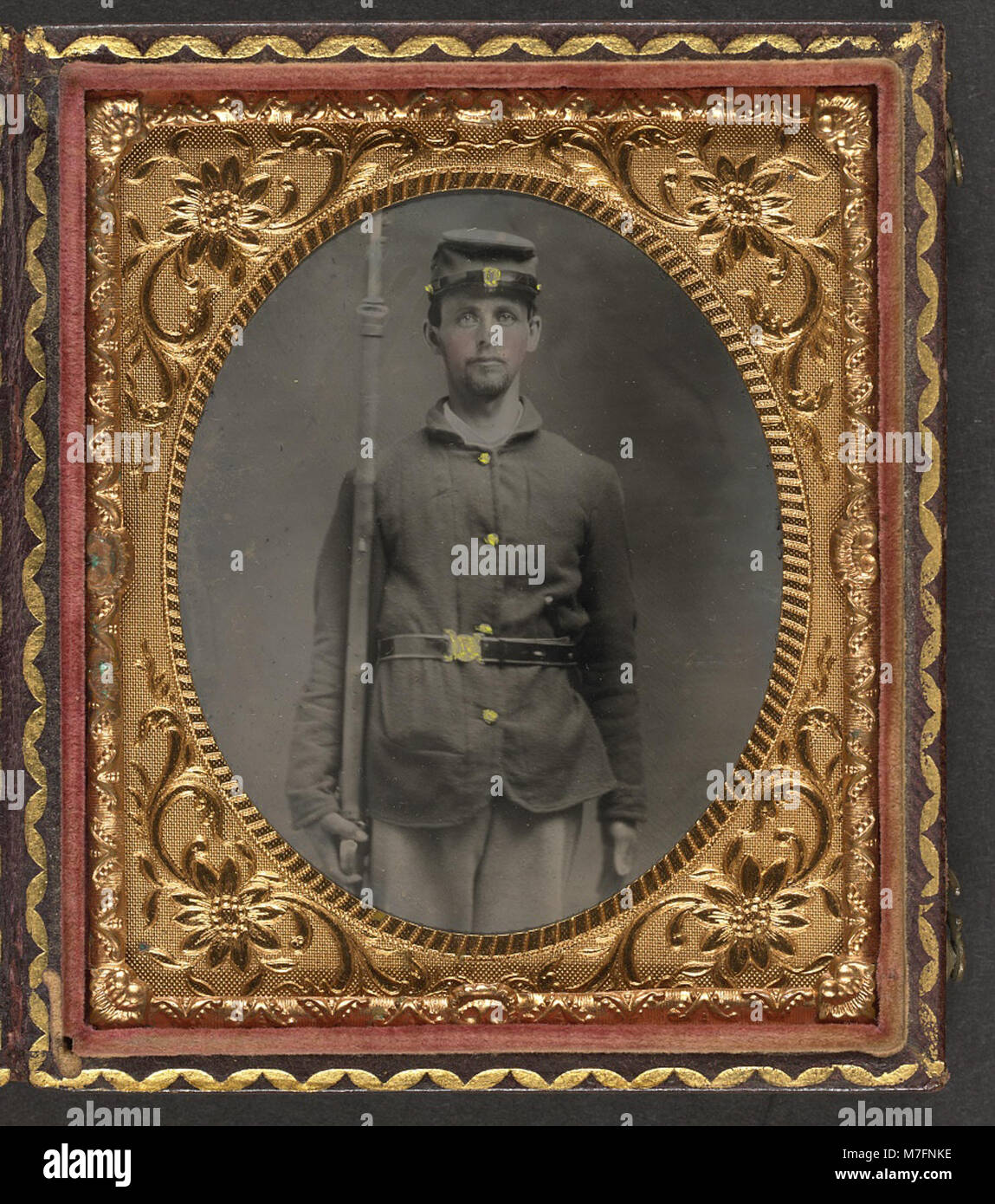 An unidentified soldier wearing a Union sack coat, forage cap, and ...