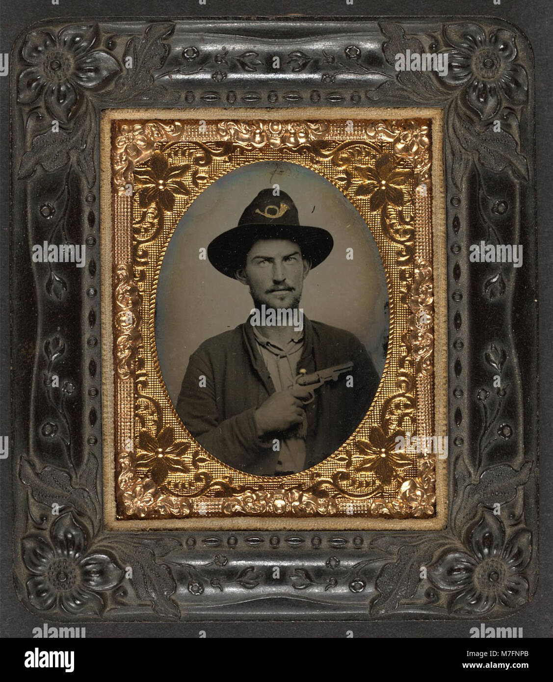 An unidentified Union soldier, dressed in a Union uniform with a slouch ...