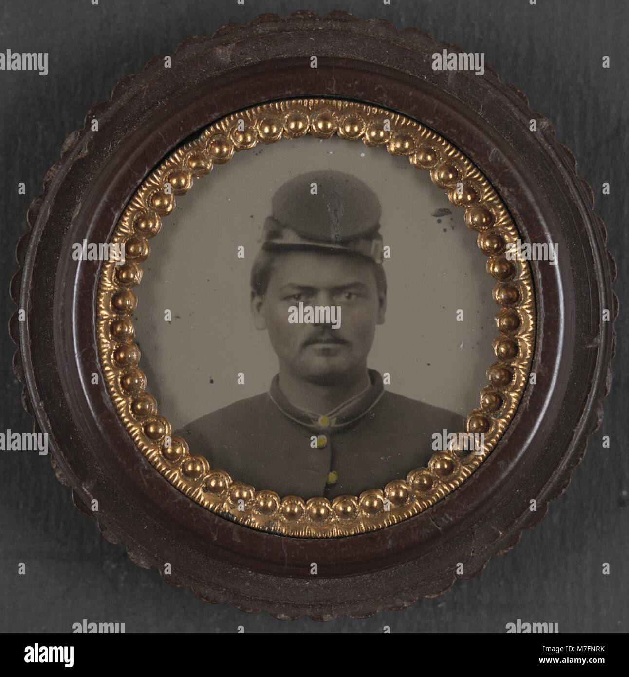 A photograph of an unidentified soldier wearing a Union uniform ...