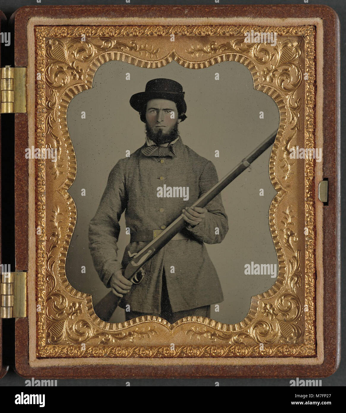 A photograph of an unidentified soldier dressed in a Western ...