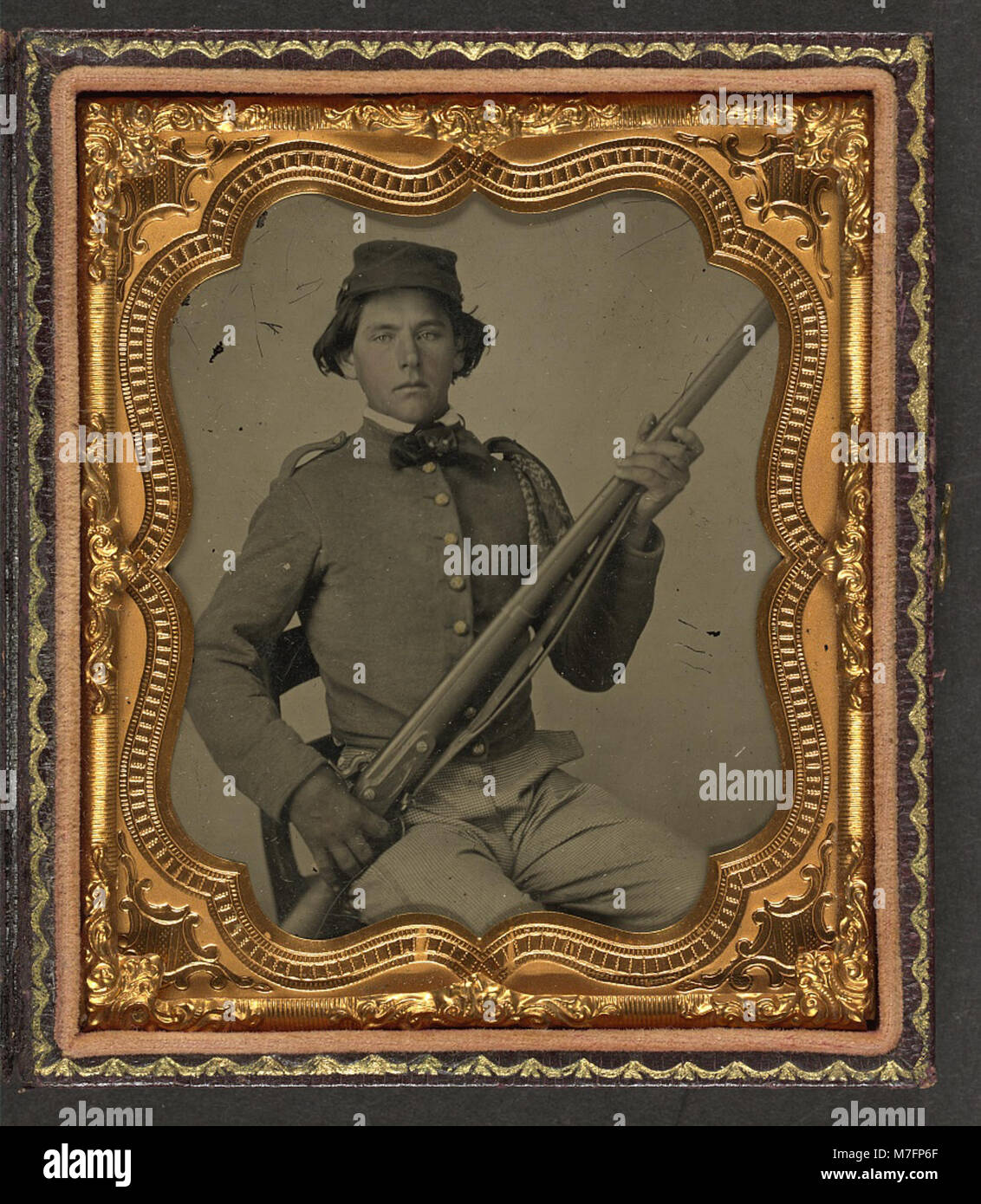 This image features a young Union soldier during the American Civil War ...