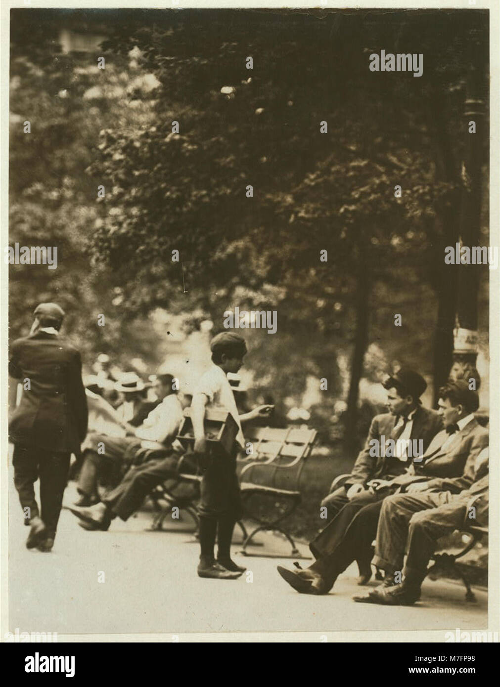 A photograph of a bootblack working at Union Square, showcasing the ...