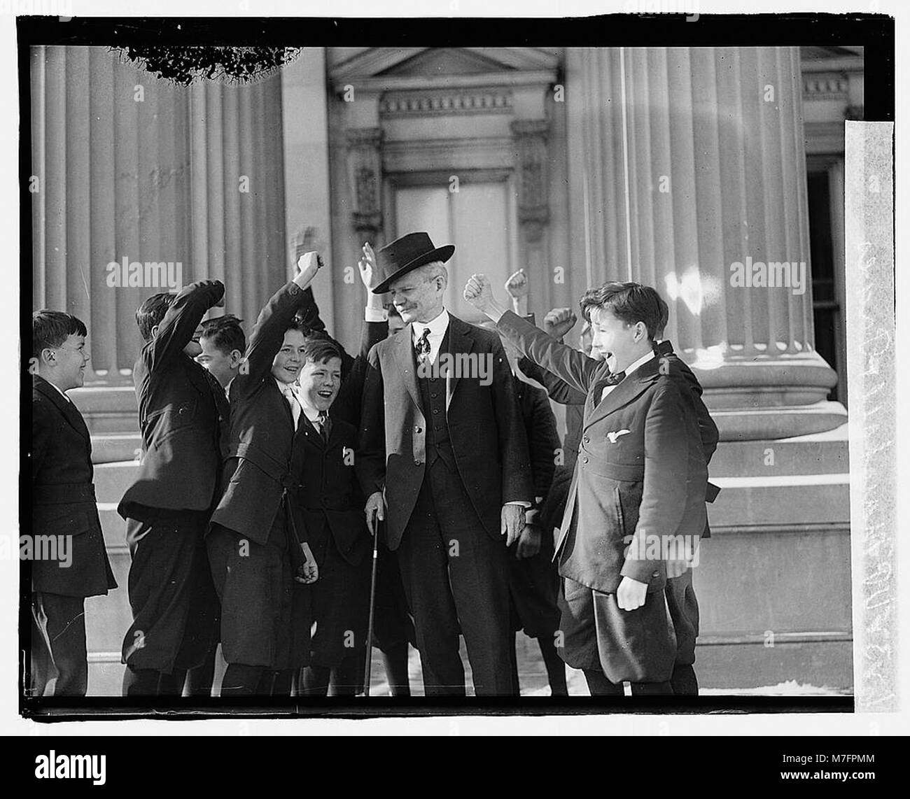 A formal portrait of Vice President Marshall with his pages. The image ...