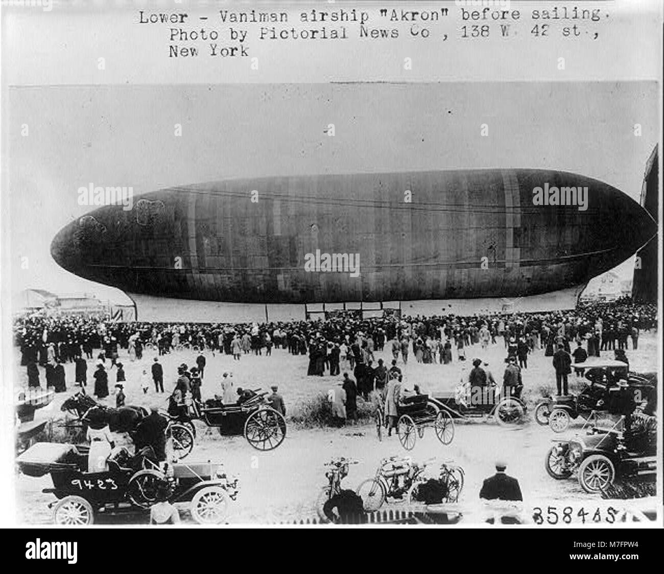 The Vaniman airship 'Akron' is shown before its departure, reflecting ...
